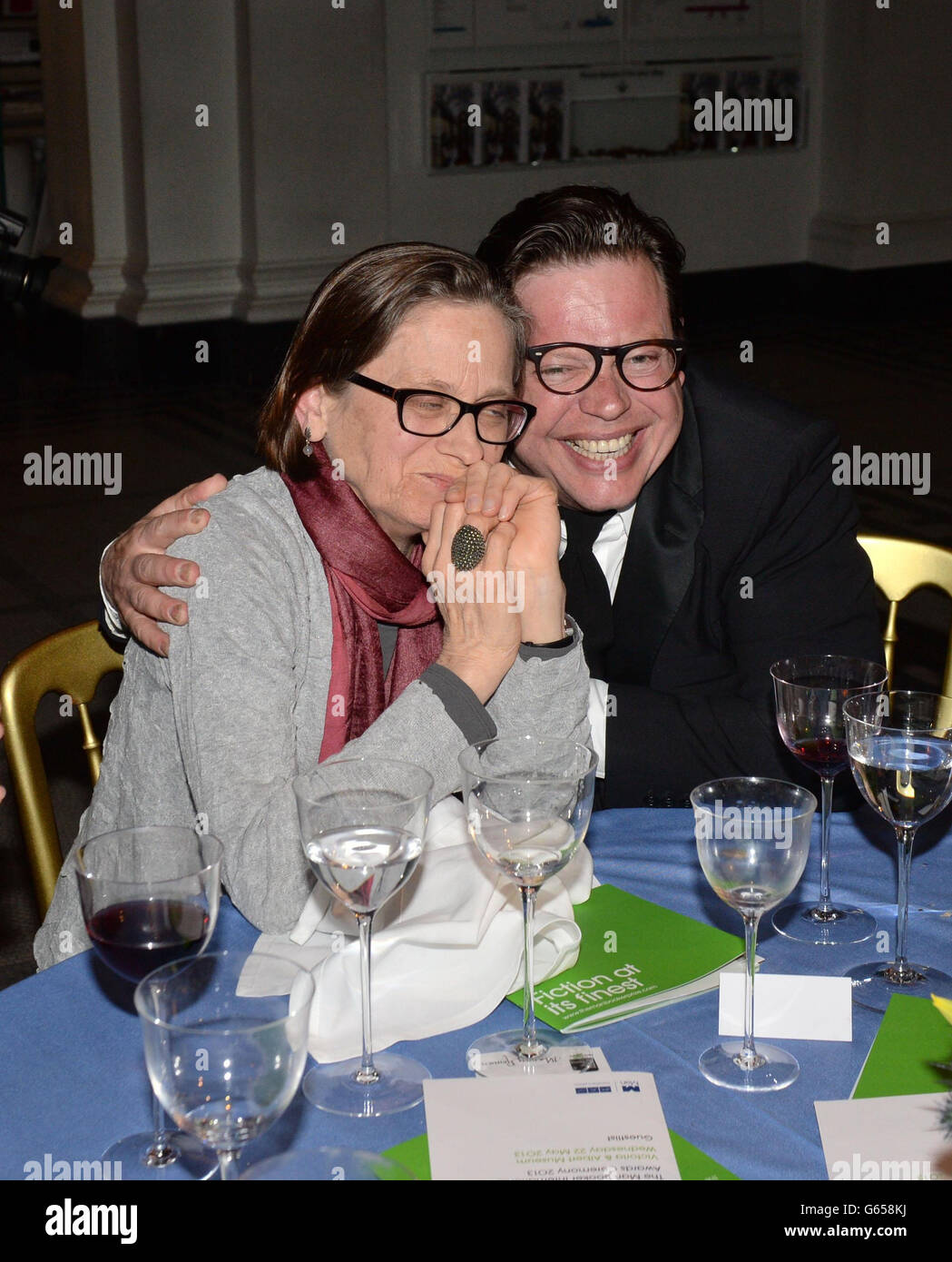 Lydia Davis (left) is congratulated by publisher Simon Prosser as she ...