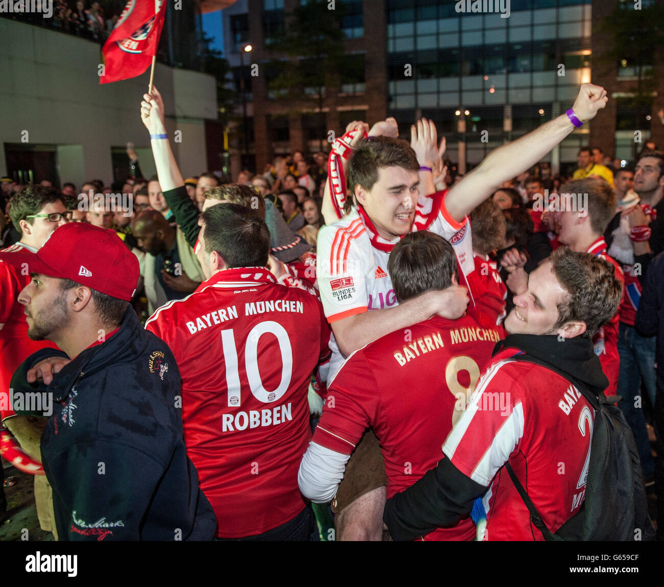 Bayern Munich fans celebrate their side's victory at Yaga Bar bar in ...