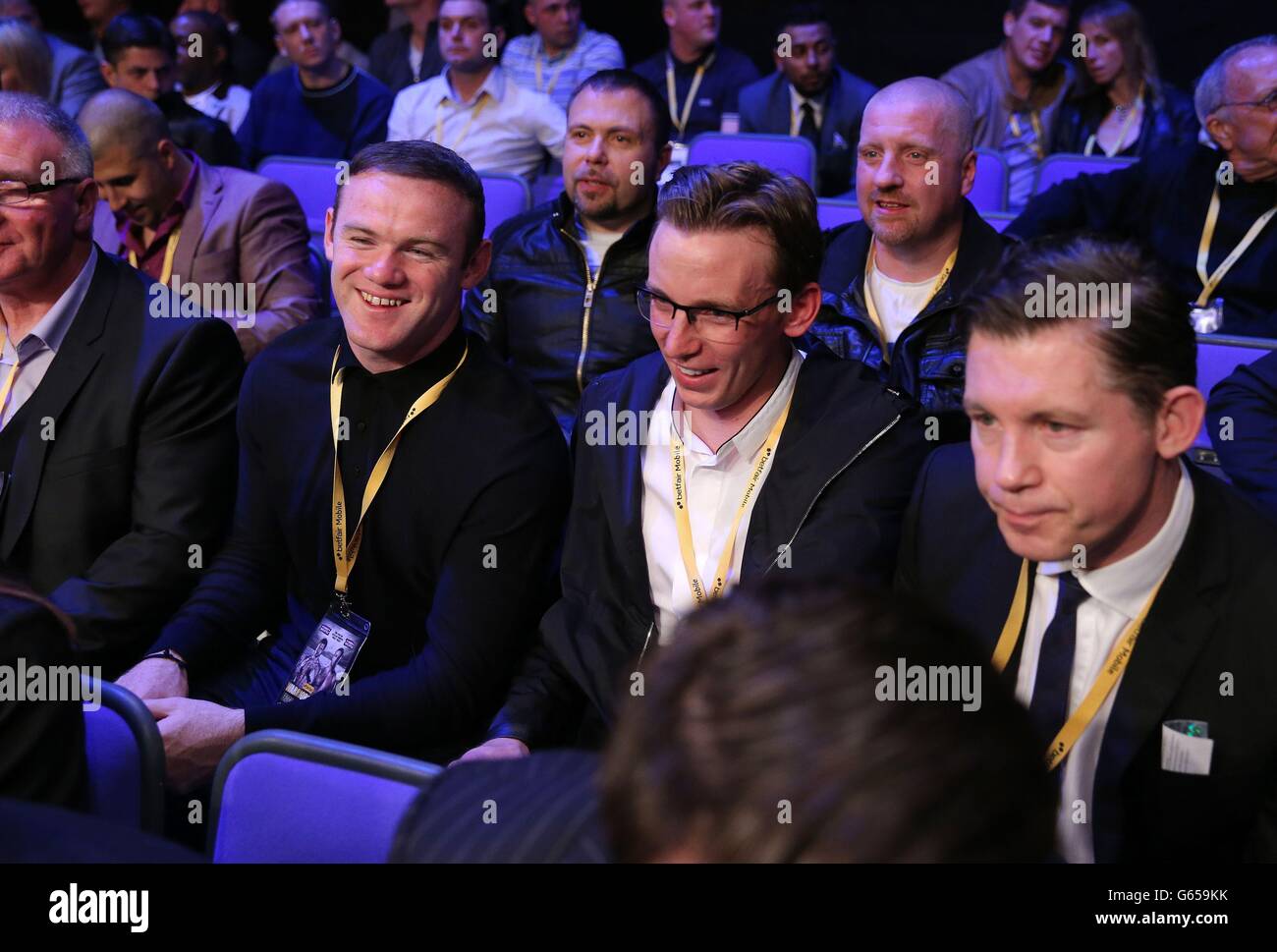 Wayne Rooney and Lee Evans (left) watches Carl Froch face Mikkel ...