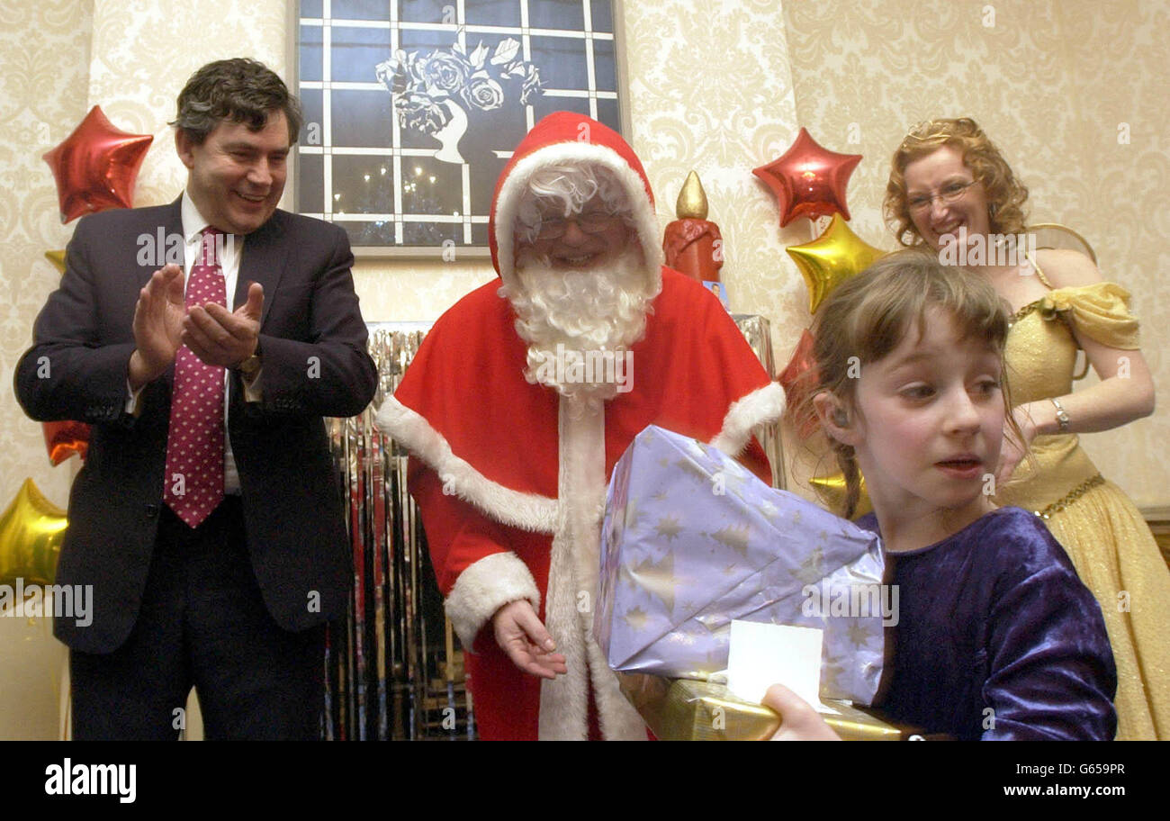 Gemma Coe, aged 7 from the Laycock Primary School in London receives a ...