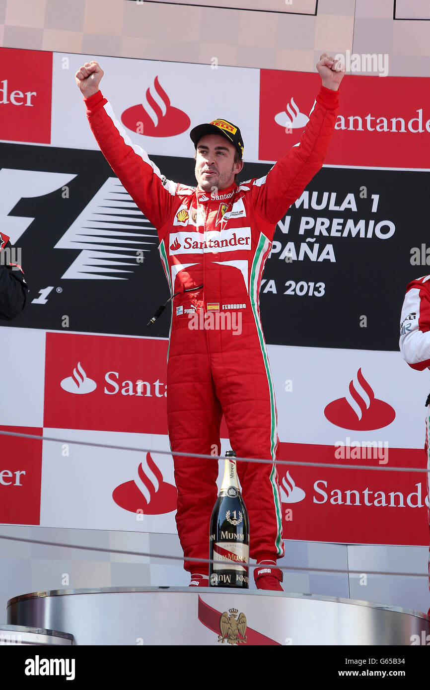 Ferrari's Fernando Alonso celebrates his victory in the Spanish Grand ...
