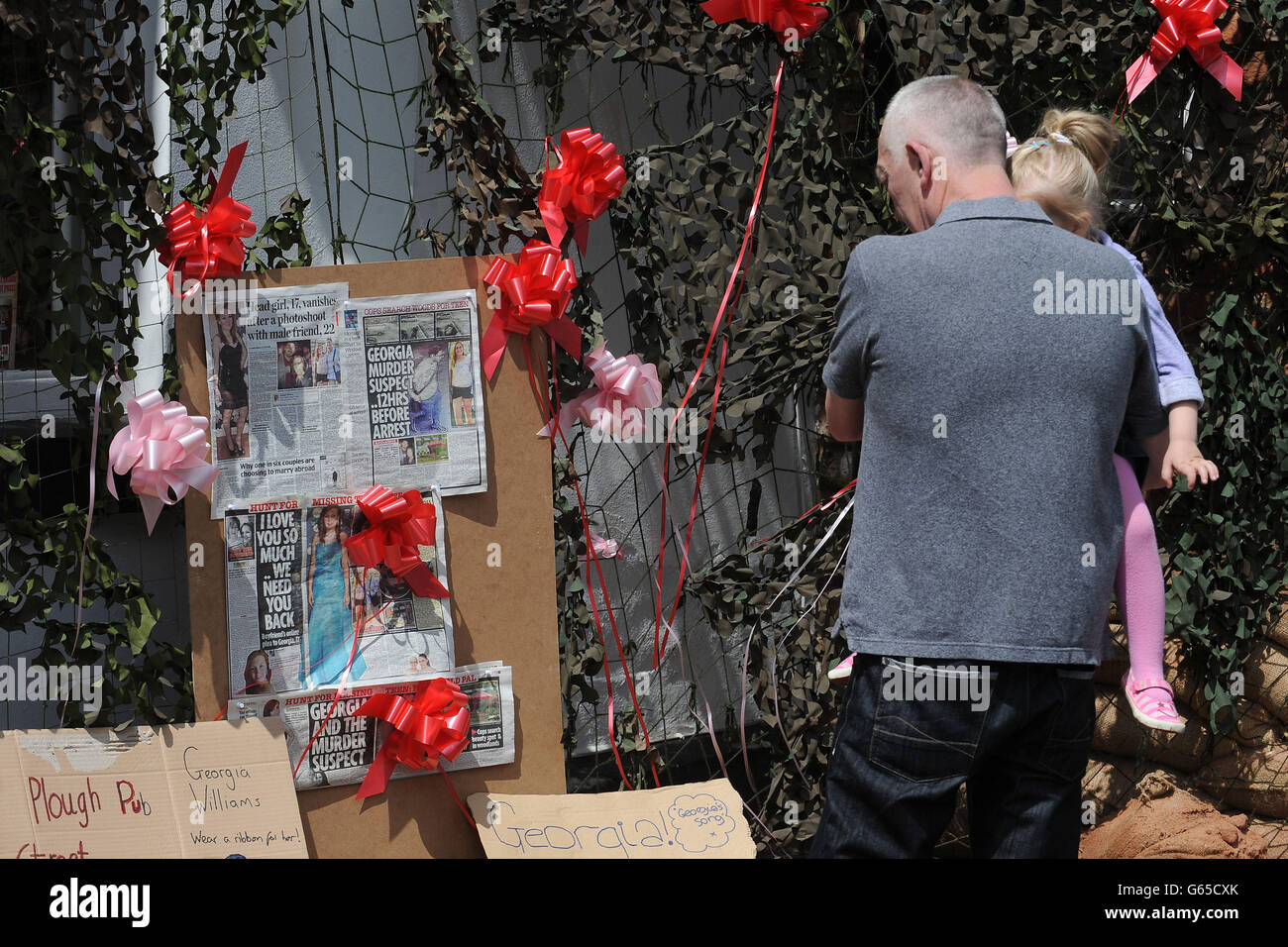 Ed and Ruby Lowe look at a tribute for missing girl Georgia Williams at ...