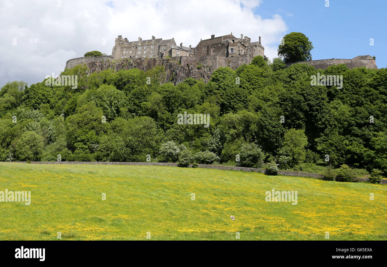 Stirling Castle is seen above fields during a spell of clement weather ...