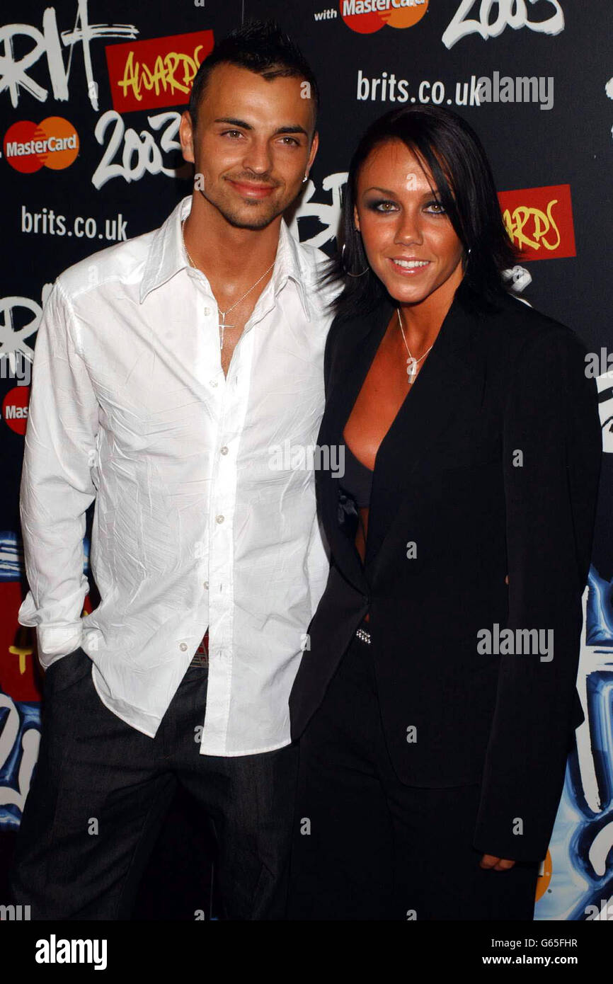 Michelle liberty andy scott lee 3sl arriving launch brit 2003 hi-res ...