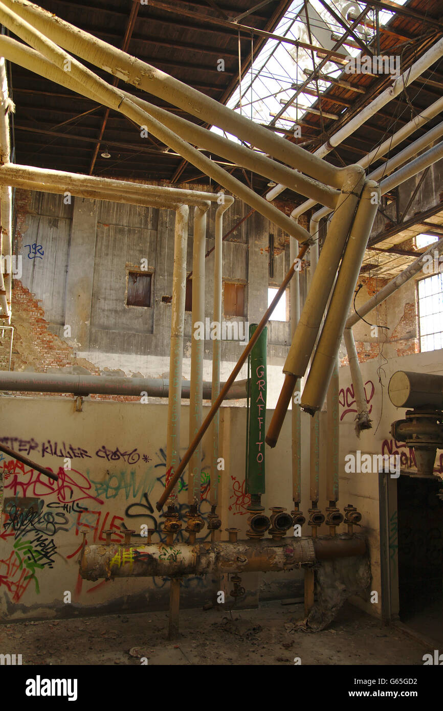 Pipes in a derelict factory in Leipzig, Germany Stock Photo - Alamy