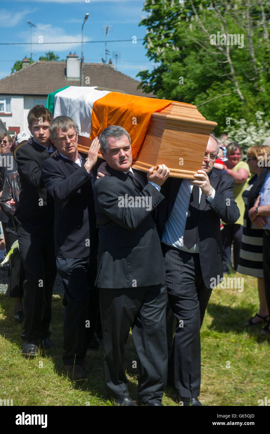 The coffin is carried at the funeral of former Republican Sinn Fein ...
