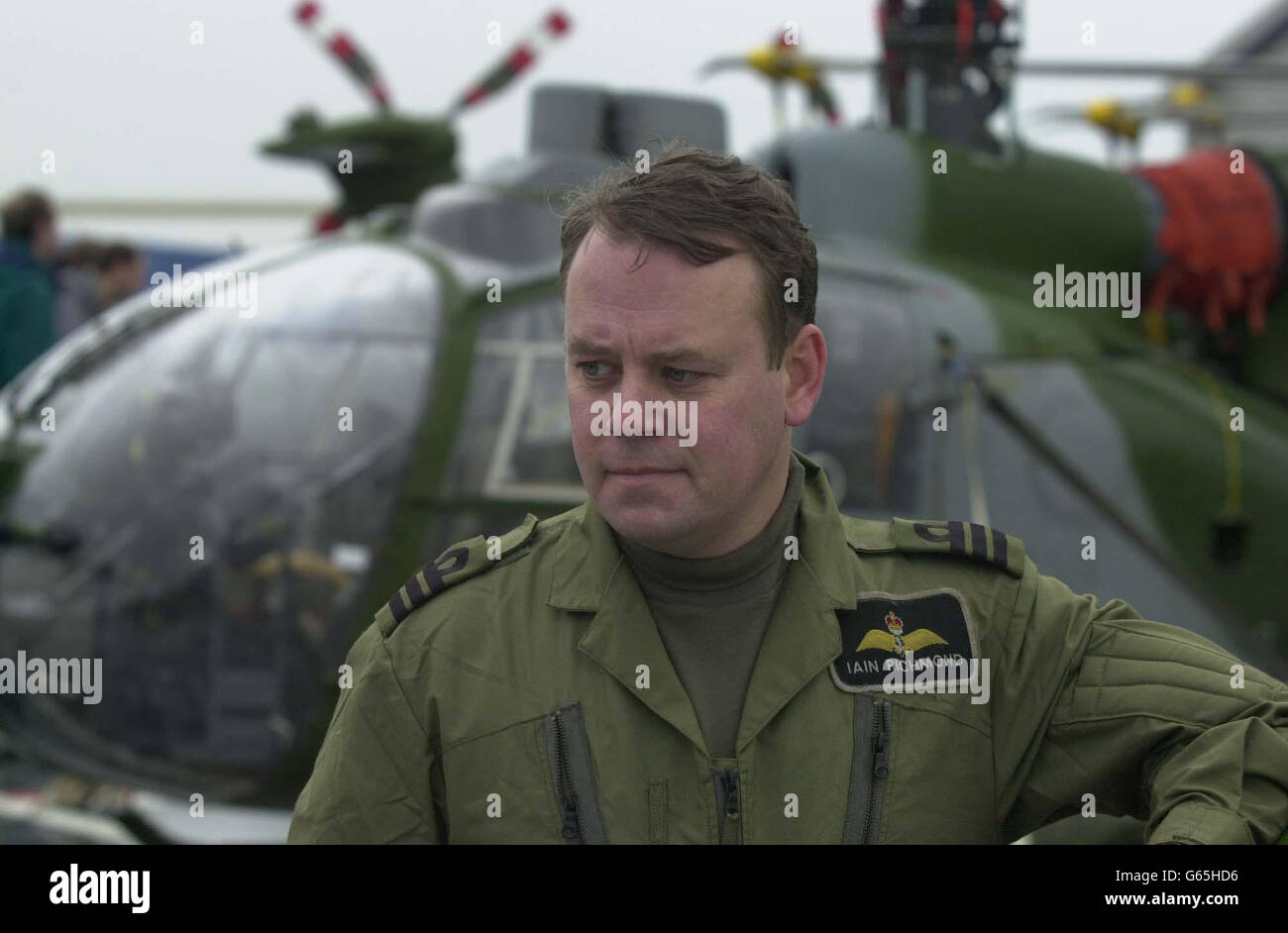 Commander Iain Richmond on the deck of the Royal Navy helicopter ...