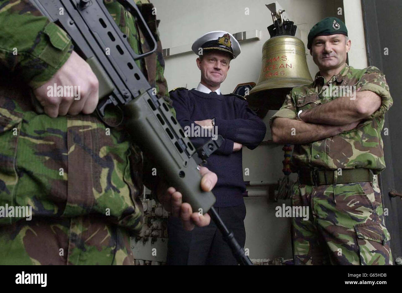 Commanding Officer of HMS Ocean, Captain Adrian Johns (left) and the ...