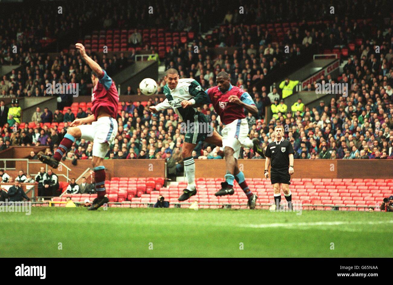 Liverpool jumps with ugo ehiogu infront of empty stands hi-res stock ...