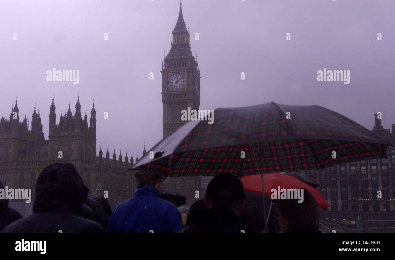 Rain clouds cast a gloomy outlook over Big Ben in Westminster, central ...