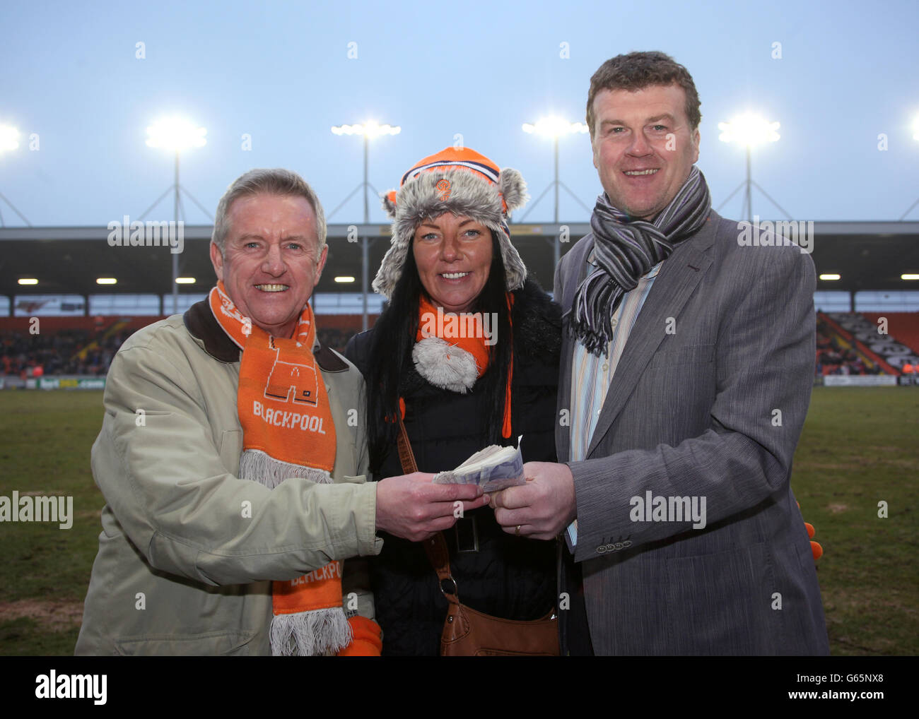 The winner of the Golden Gamble poses for a photograph Stock Photo - Alamy