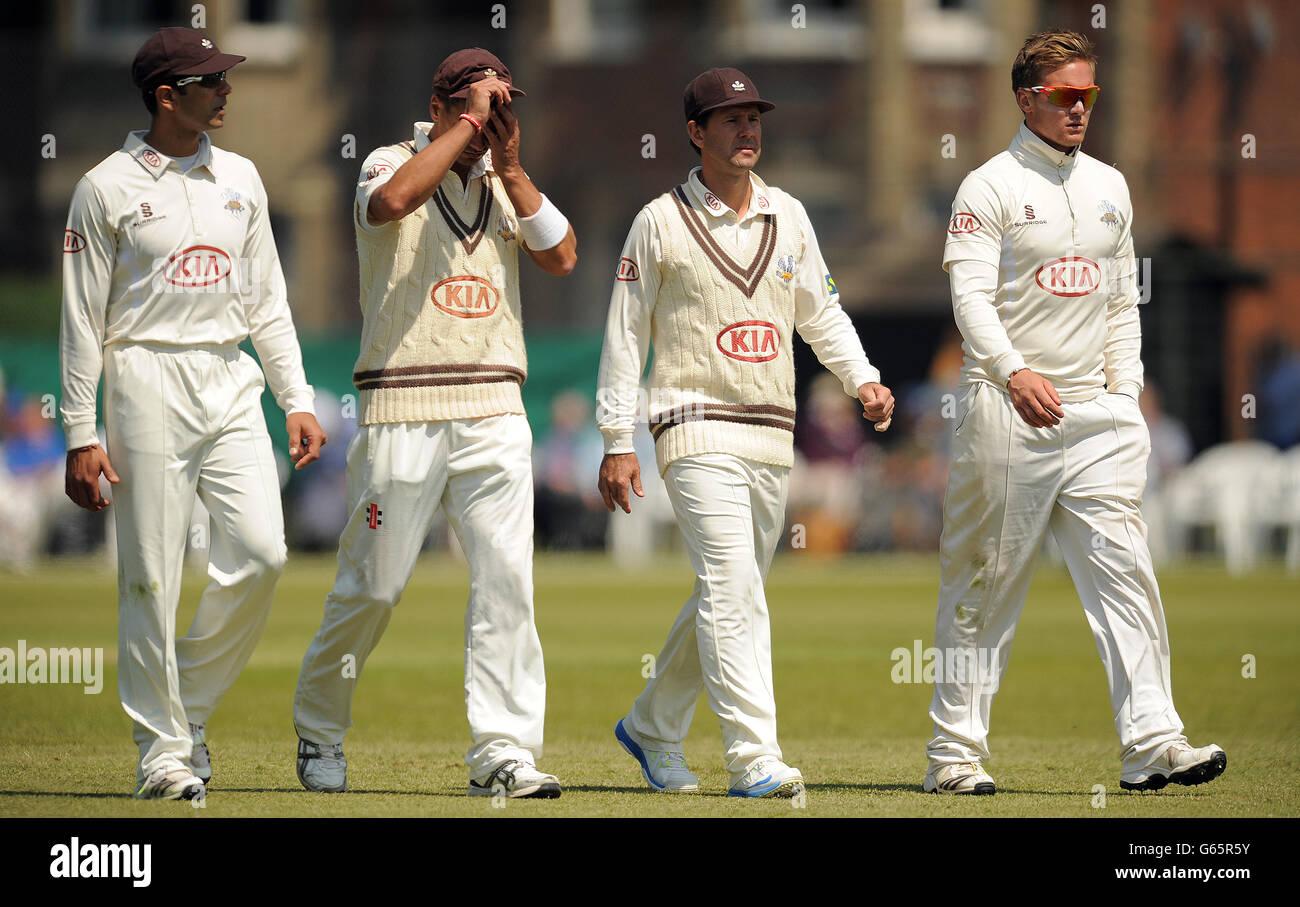 Surrey captain Vikram Solanki (left), Zander de Bruyn (2nd left), Ricky ...