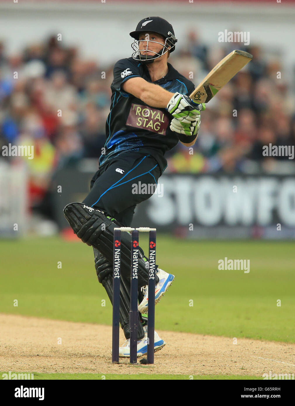 New Zealand's Martin Guptil hits the ball for six runs Stock Photo - Alamy