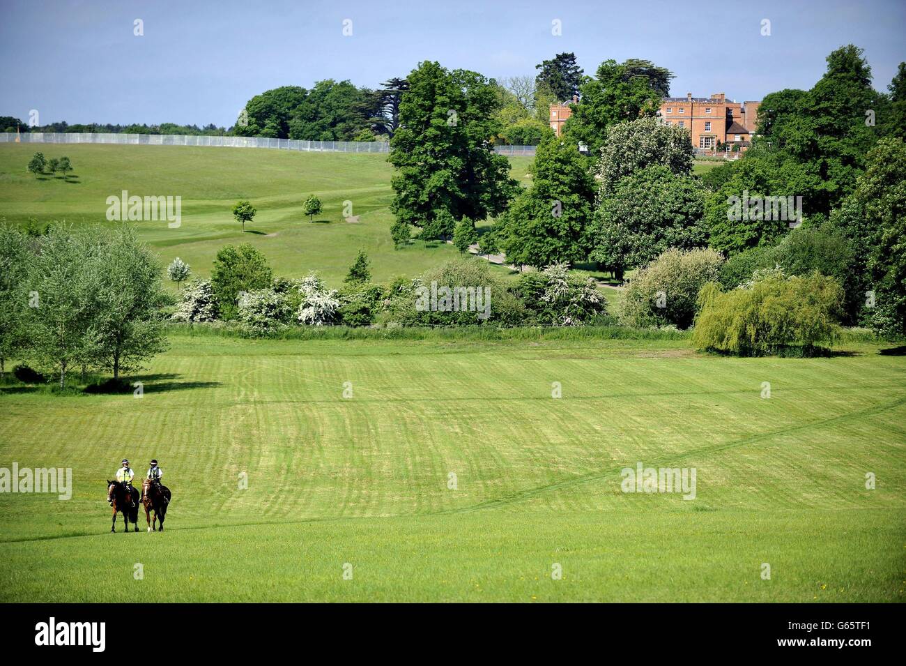 Police patrol the grounds of the Grove Hotel, in Watford prior to the ...