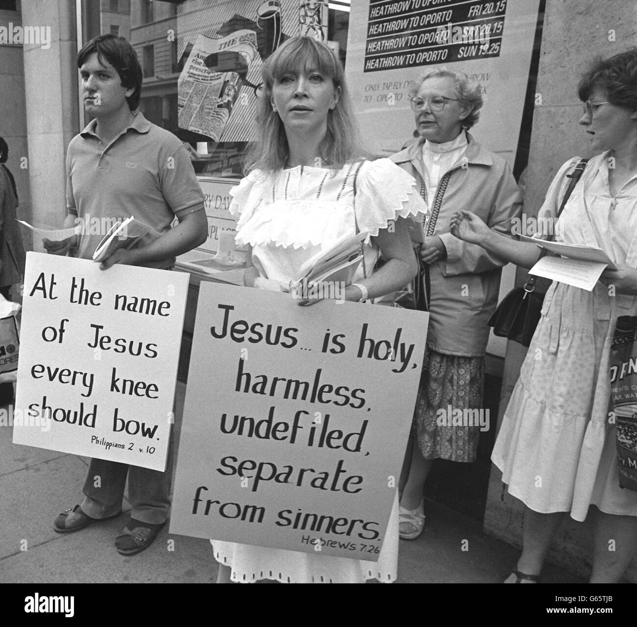 Gavin Childress and Esther Macken with placards outside the Plaza ...