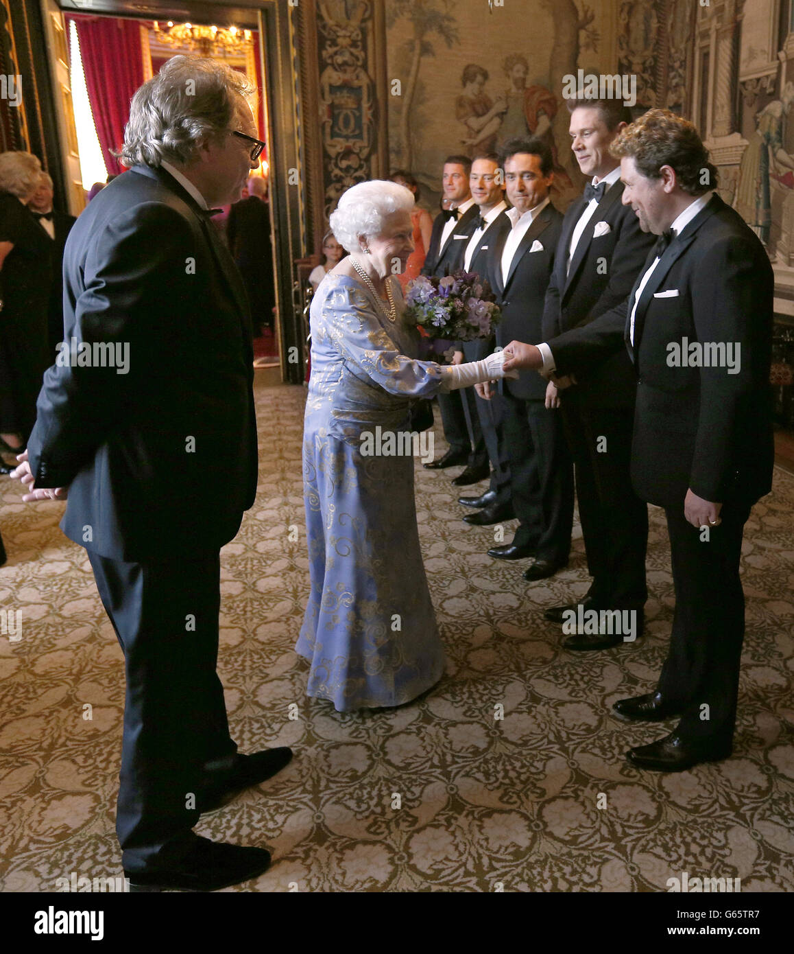 Phil Bowdery (left) introduces Michael Ball to the Queen during a ...