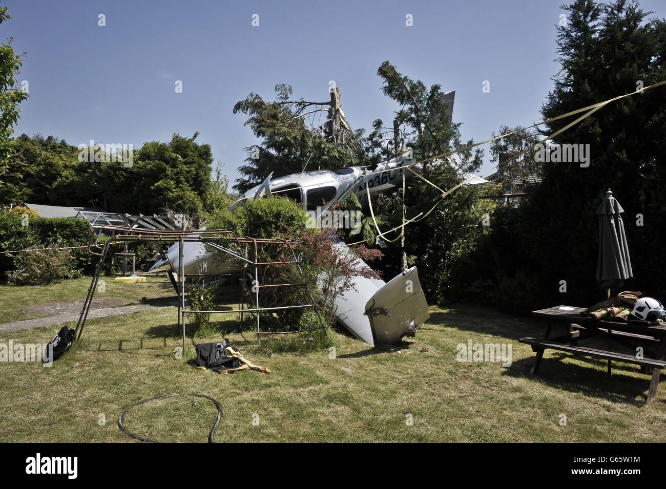 Plane crashes into garden Stock Photo - Alamy
