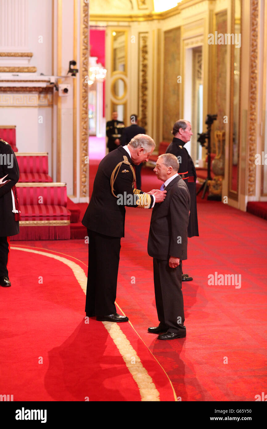 Mr. Derek Wood from Farnborough is made an MBE by the Prince of Wales ...