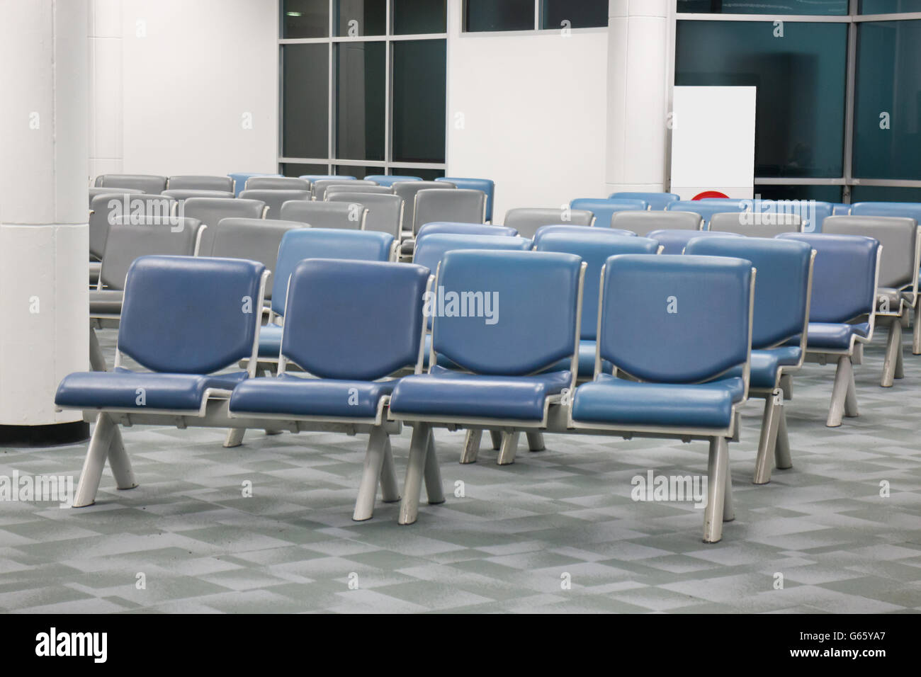 Row of leather waiting chairs hi-res stock photography and images - Alamy