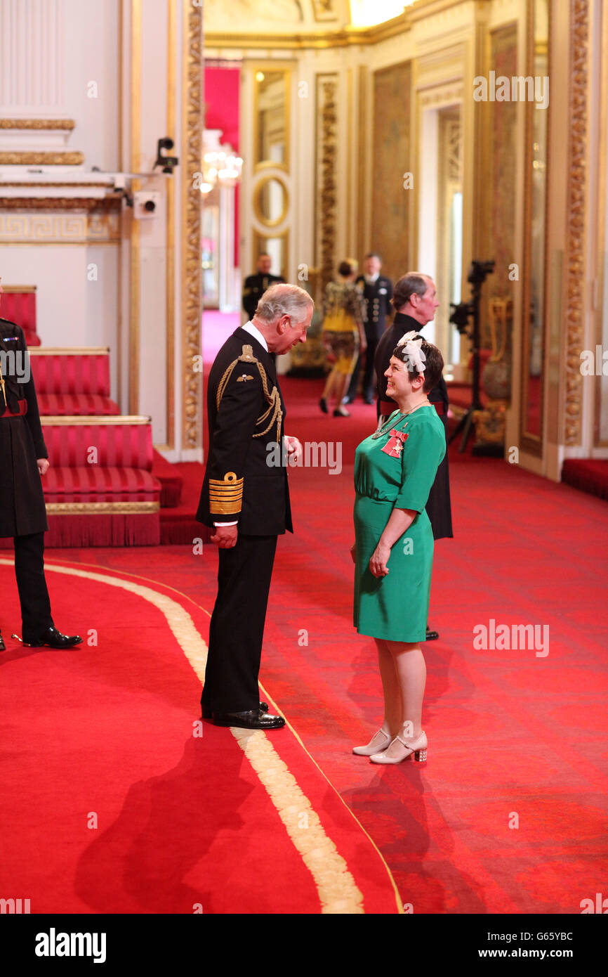Rosie Wolfenden from London is made an MBE by the Prince of Wales at ...