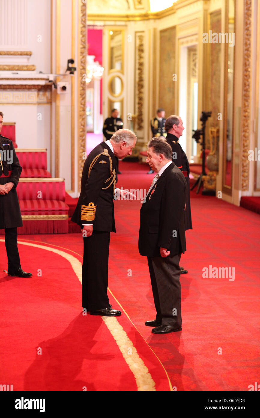 Mr. Spencer Freeman from Eastbourne is made an MBE by the Prince of ...