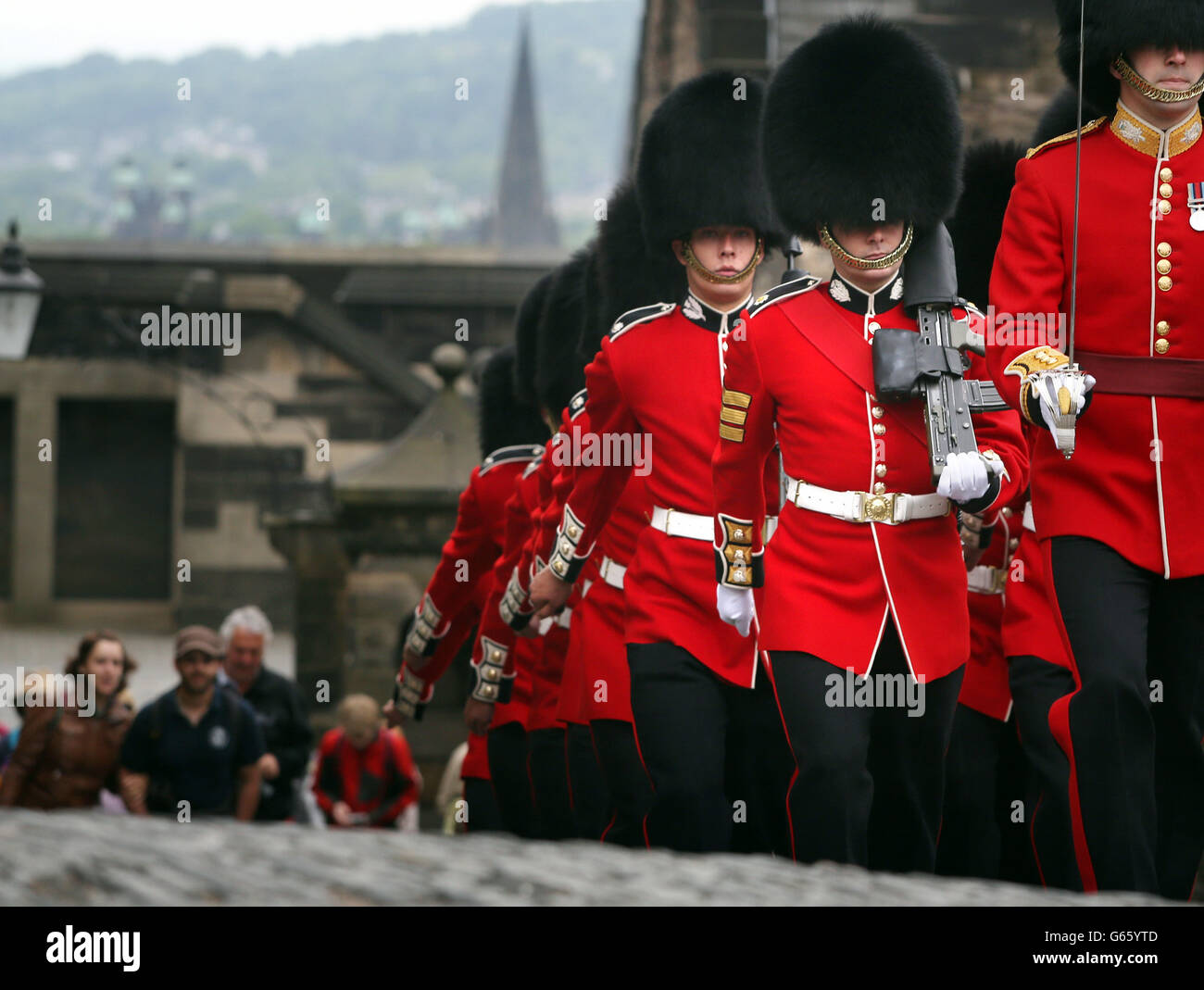 Guards parade before a 21 - Gun Royal Salute is fired by Edinburgh ...