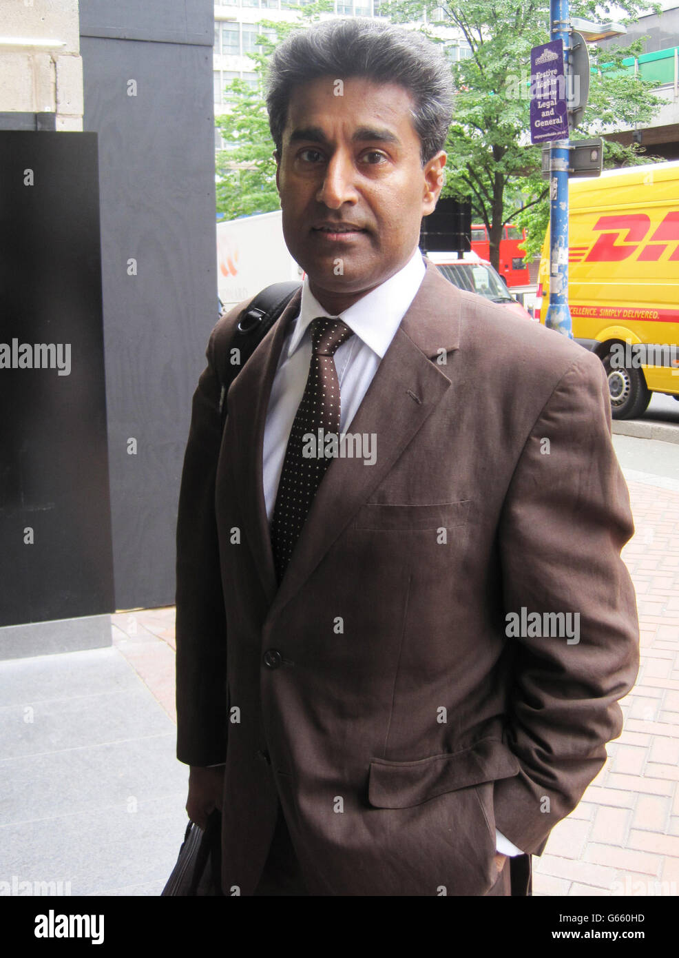 Dr Raj Mattu arriving at an employment tribunal in Birmingham. Dr Mattu ...