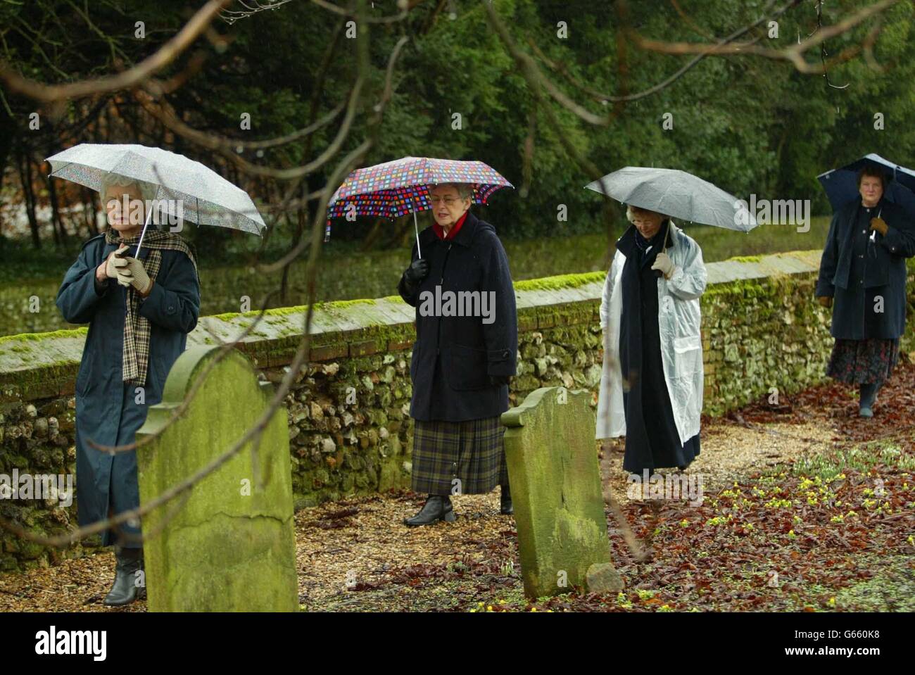 Members of the Public turn out in the rain to see the Duke of Edinburgh ...