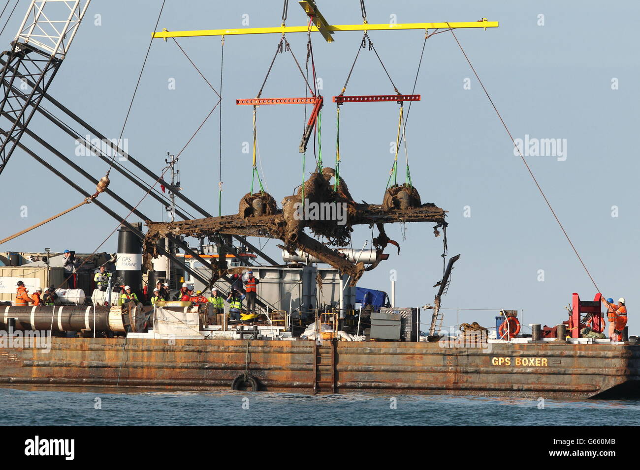 Lifting equipment raises a World War II Dornier bomber, the only ...