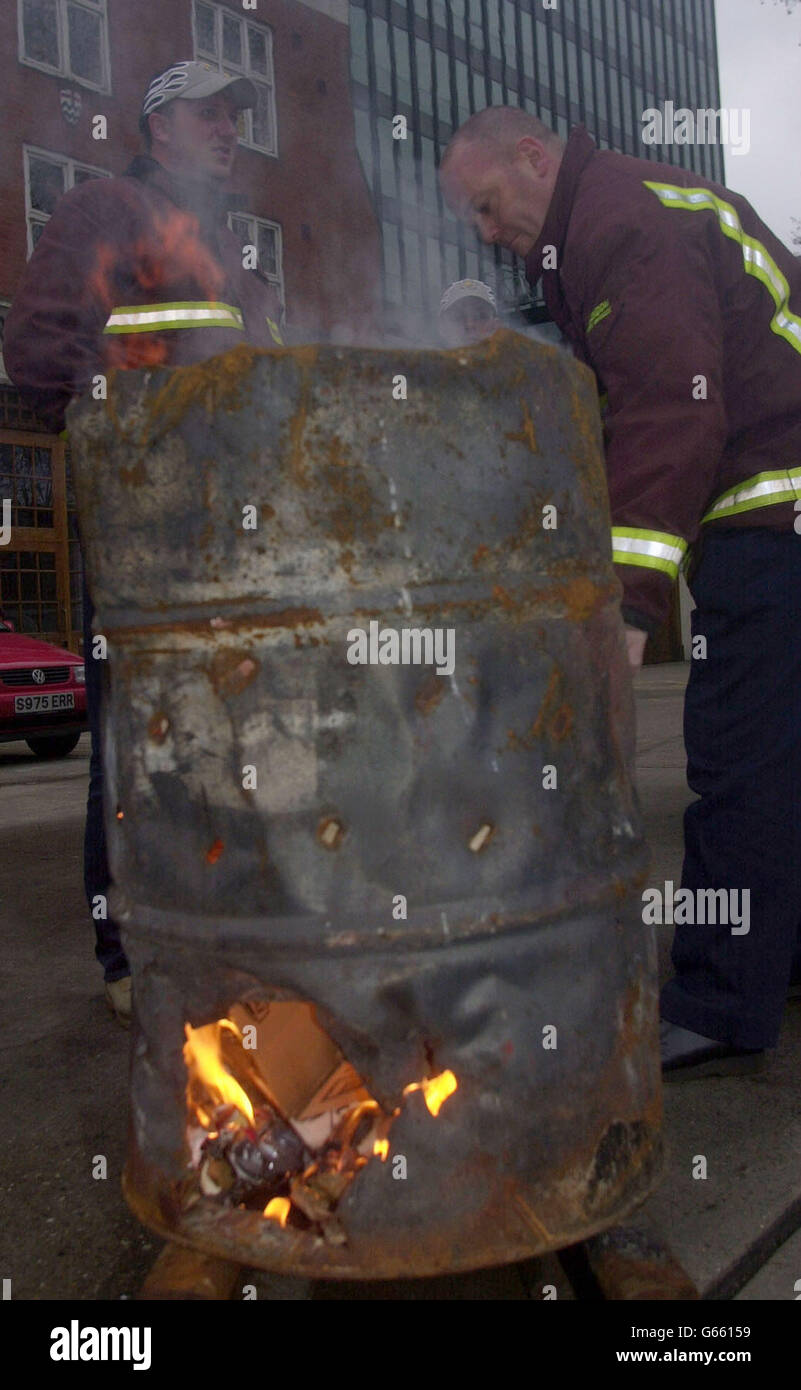 Steve Chaplin (right), from Chingford in Essex and a fire fighter at ...