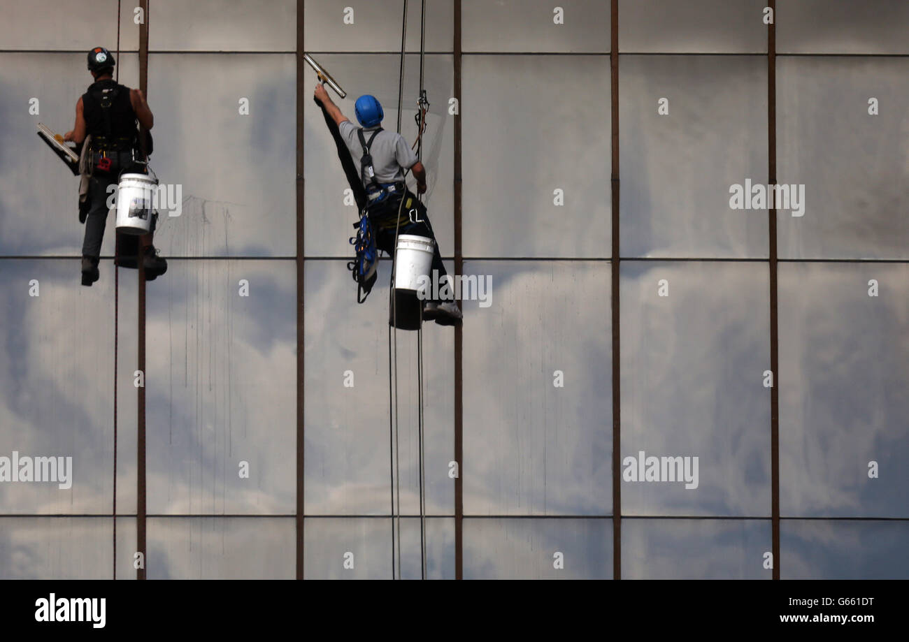 Travel stock - Perth - Australia. Window cleaners absail down a ...