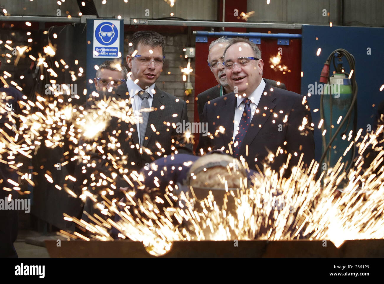 First Minister Alex Salmond (right) is pictured with Millar Callaghan ...