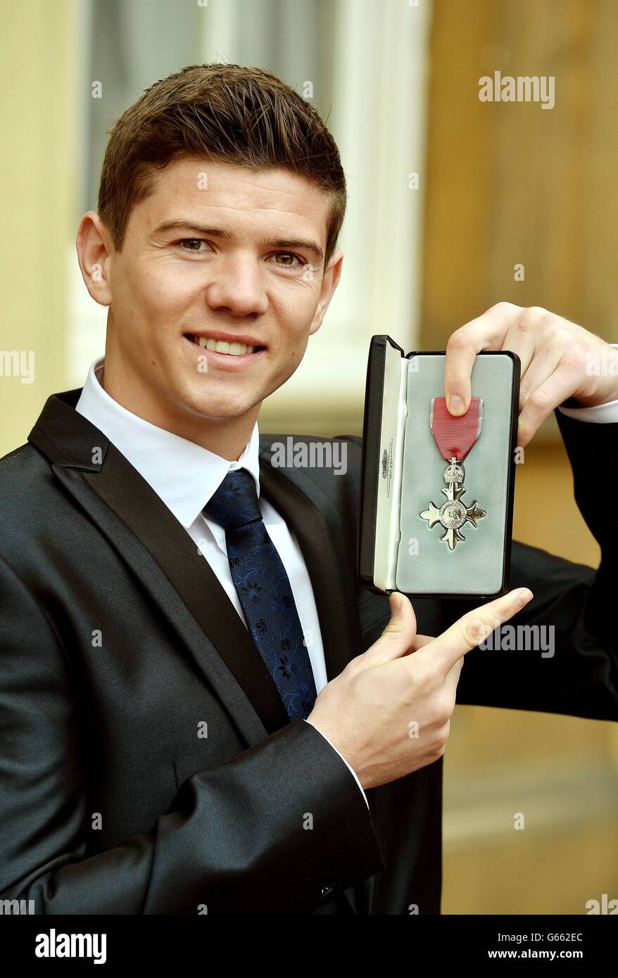 Olympic Boxer Luke Campbell proudly holds his MBE (Member of the ...
