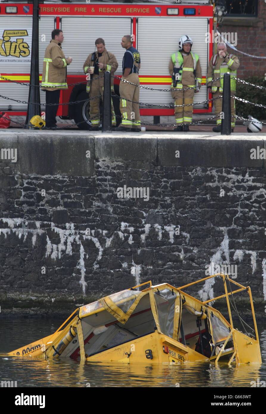 General view of emergency services after an amphibious tour bus with 30 ...