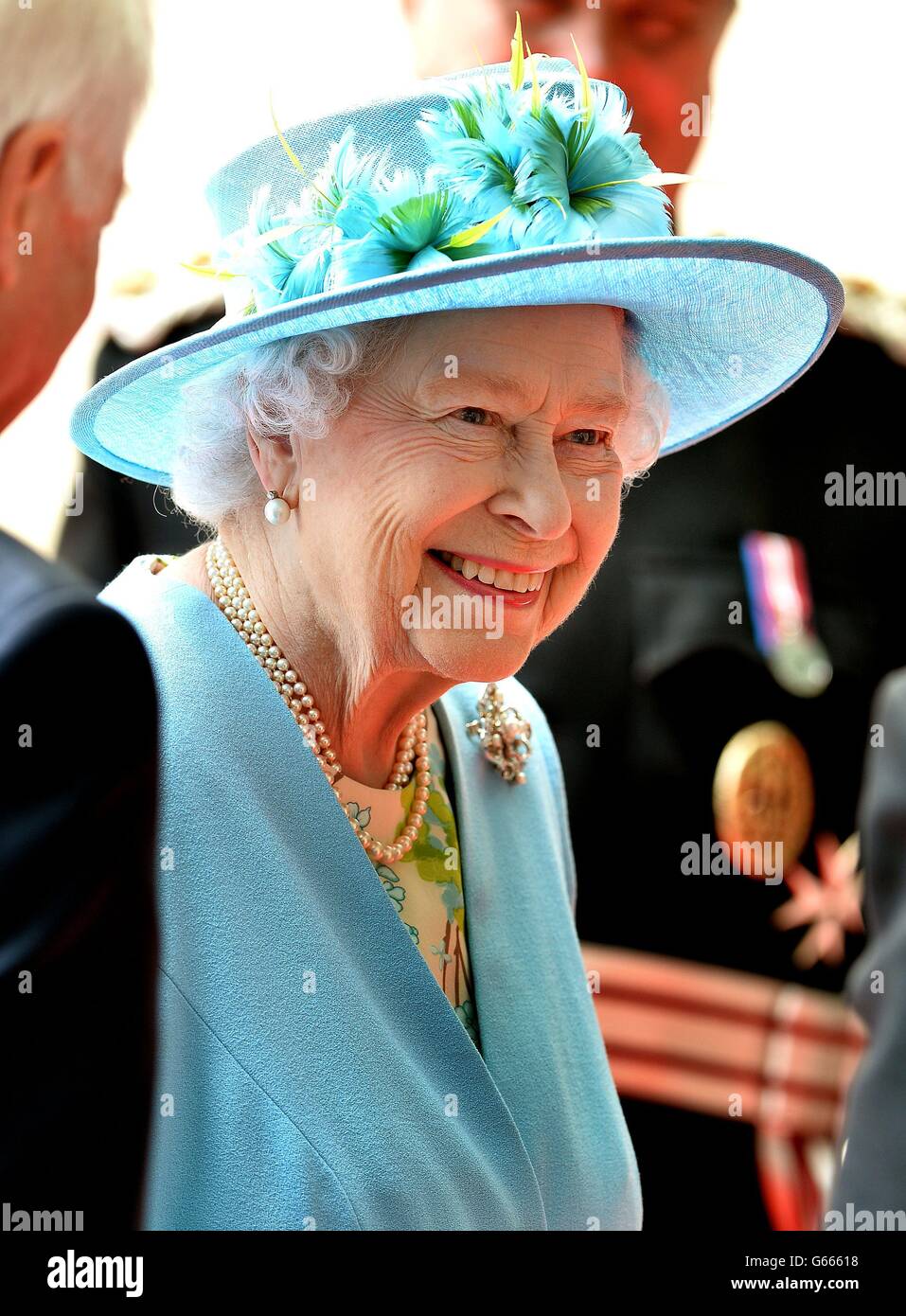 Queen Elizabeth II arrives to officially open the BBC's new 1 billion ...