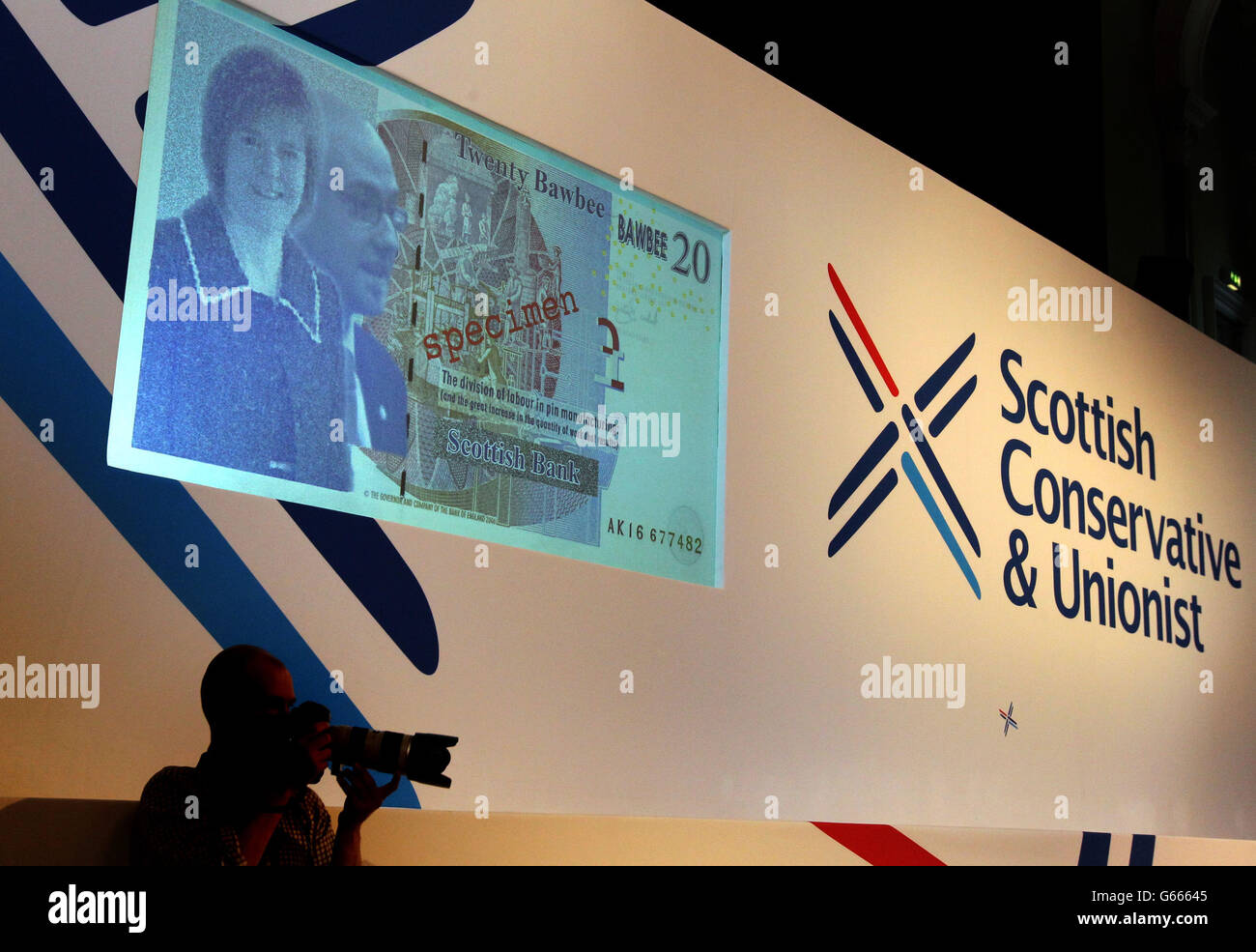 A fake bank note featuring Nicola Sturgeon is shown on a screen before ...