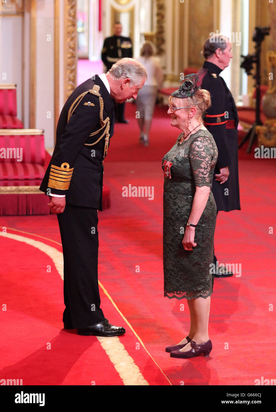 Made mbe by prince wales investiture ceremony buckingham palace hi-res ...