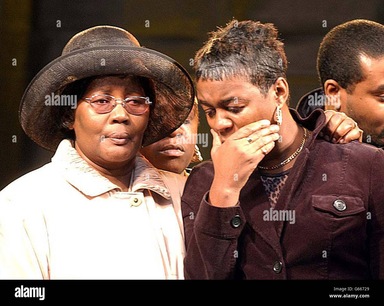 Beverley Thomas (right), mother of Charlene Ellis is comforted by an ...