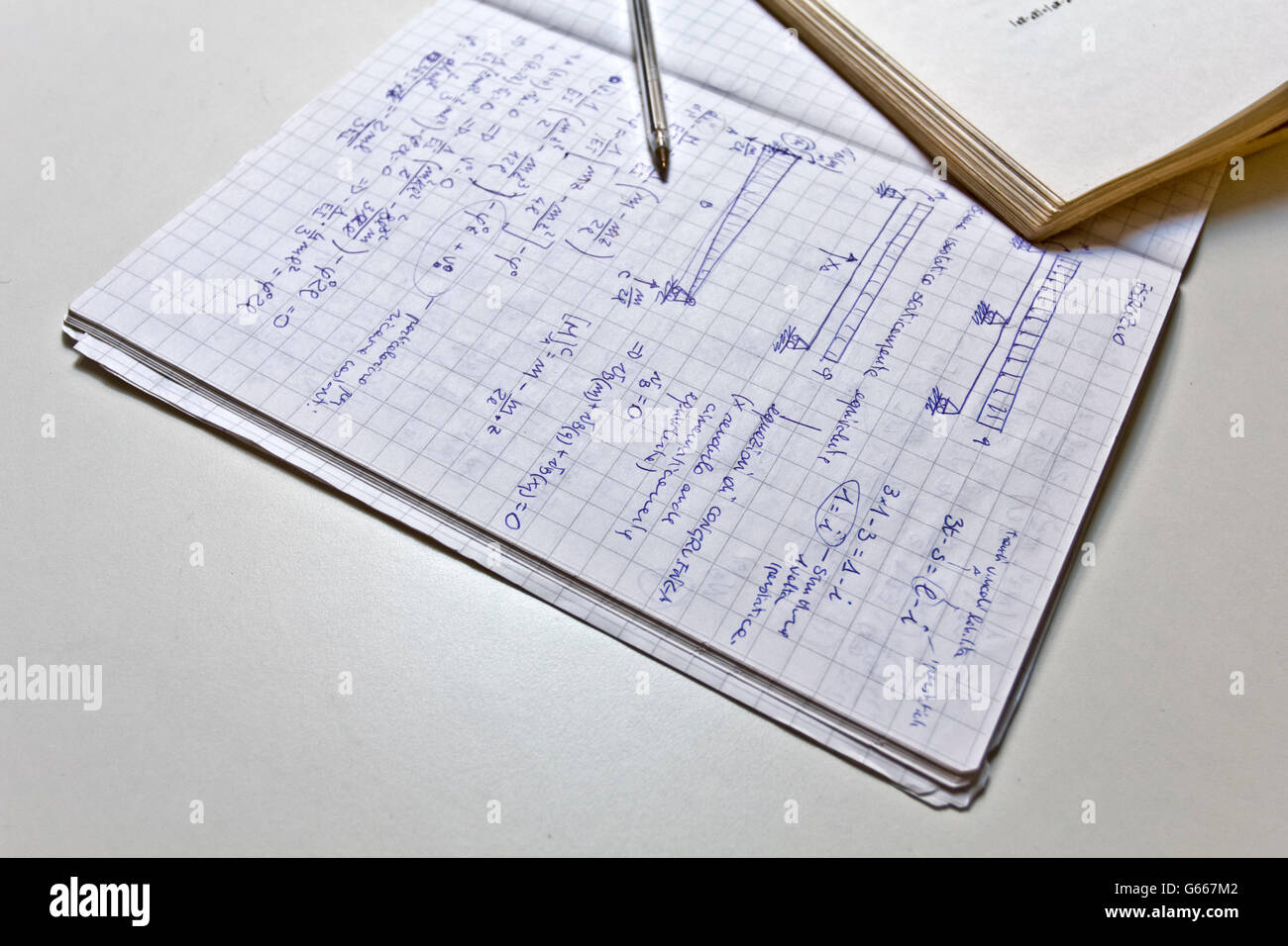 Studying physics, notes Stock Photo - Alamy