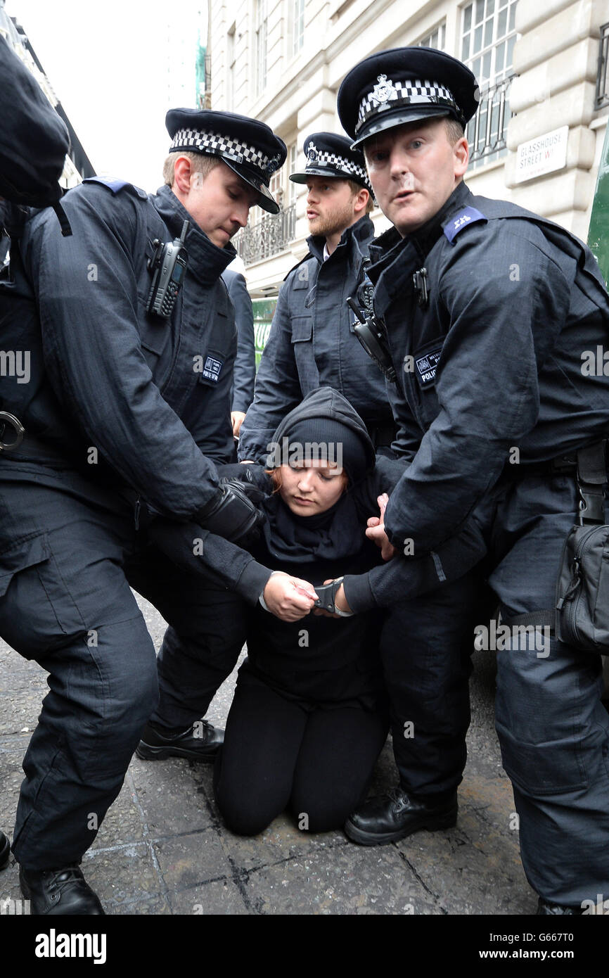 Restrain police hi-res stock photography and images - Alamy