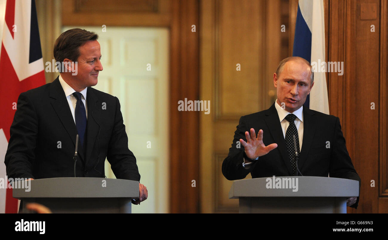 Prime Minister David Cameron (left) with Russian President Vladimir ...