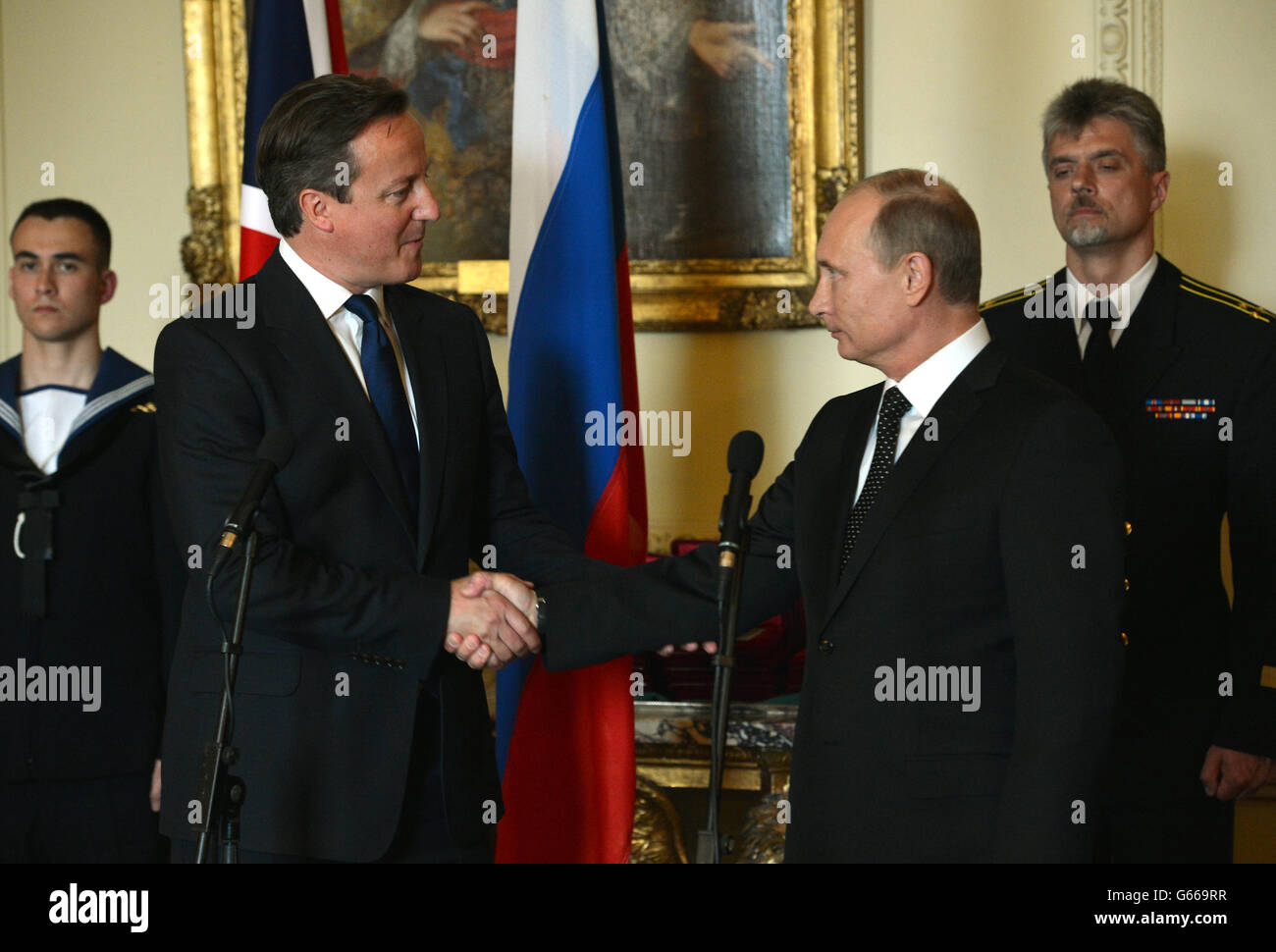 Prime Minister David Cameron (left) and Russian President Vladimir ...
