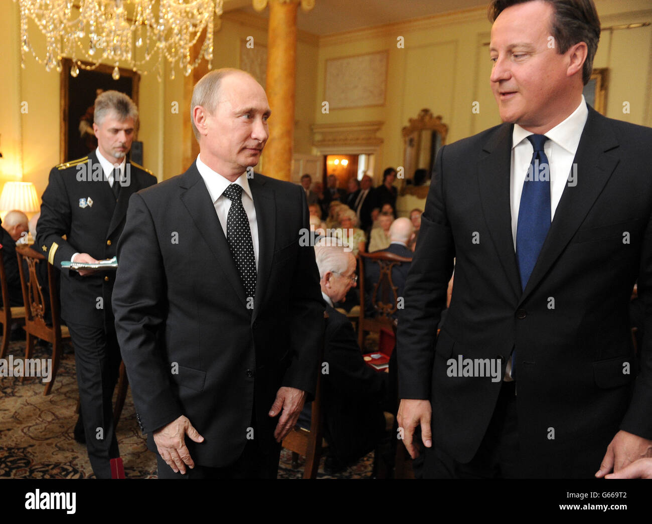 Prime Minister David Cameron (right) and Russian President Vladimir ...