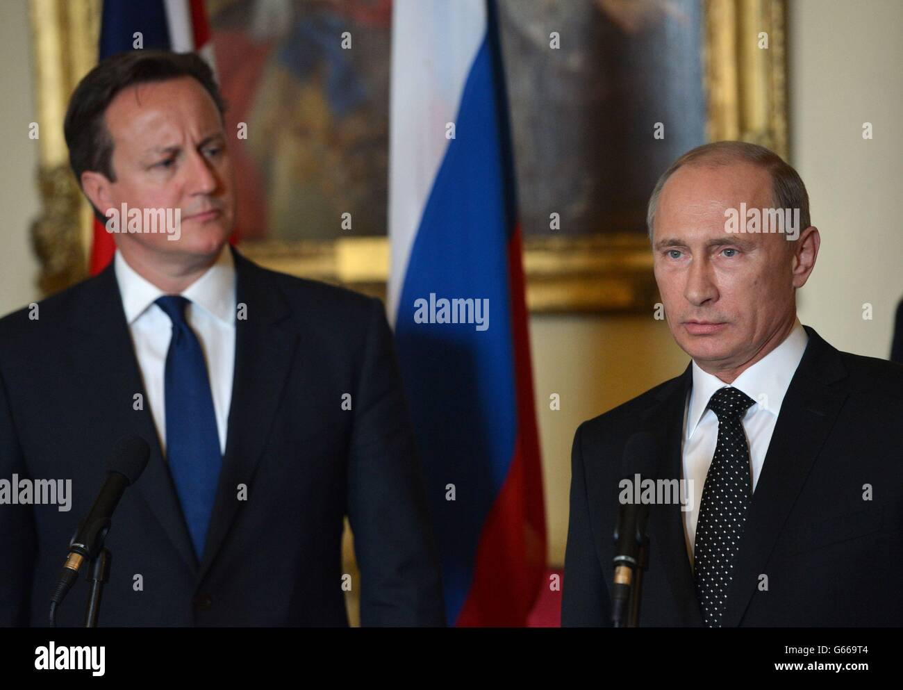 Prime Minister David Cameron (left) and Russian President Vladimir ...
