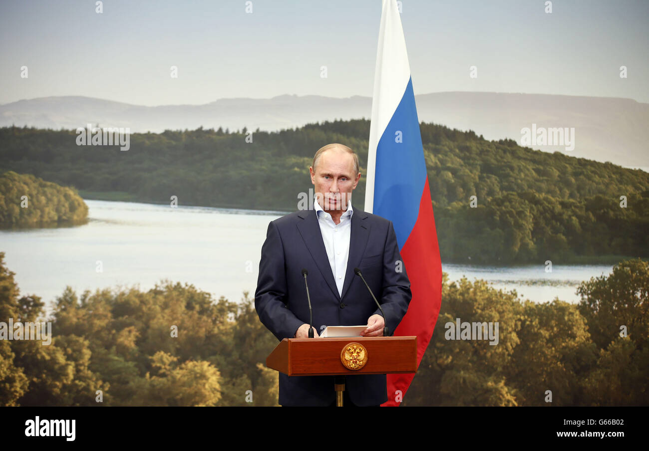 Russian President Vladimir Putin speaks during a media conference after ...