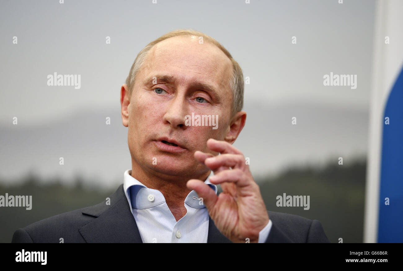 Russian President Vladimir Putin speaks during a media conference after ...