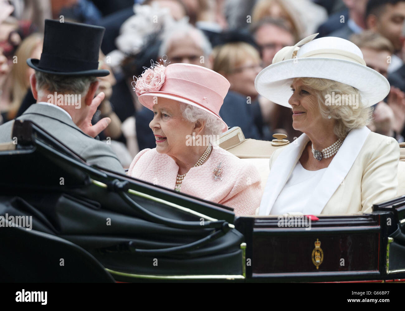 Queen Elizabeth II and The Duchess of Cornwall in the carriage during ...
