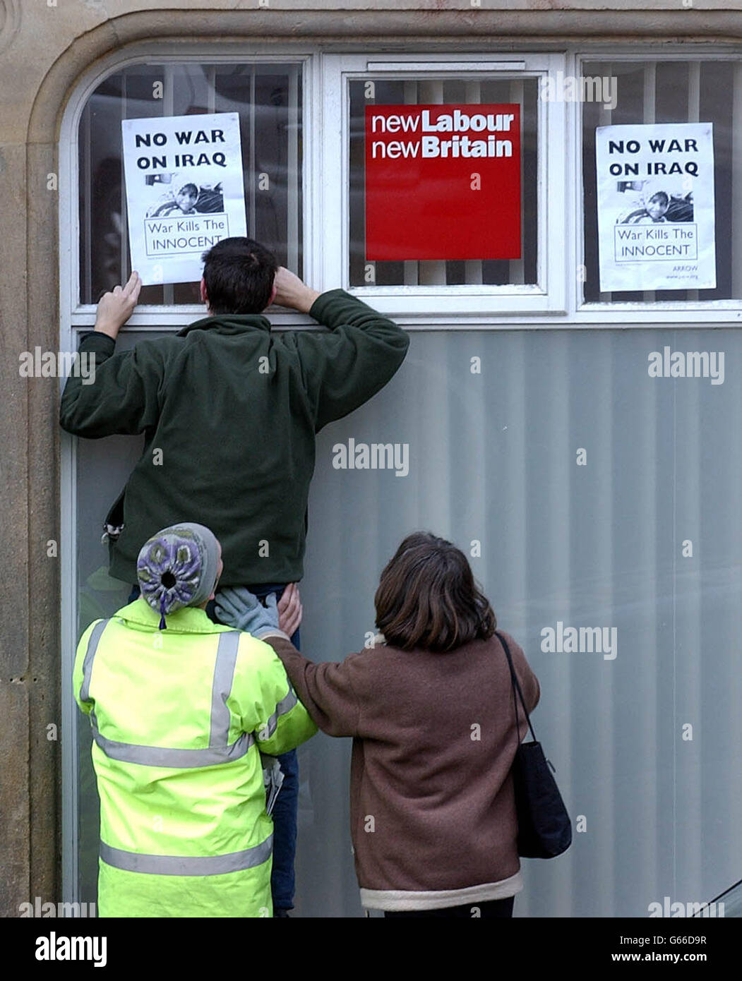 Anti-war protestors place signs on the Labour Party Headquarters in ...