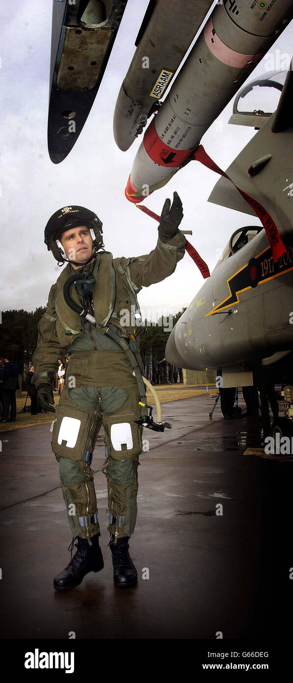 Squadron leader Tim Bullement about to board his Tornado F3. His ...
