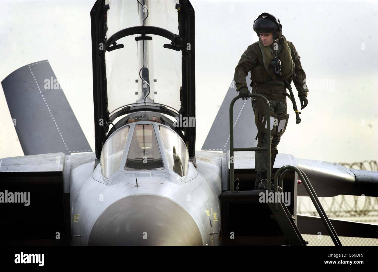Squadron leader Tim Bullement about to board his Tornado F3. His ...